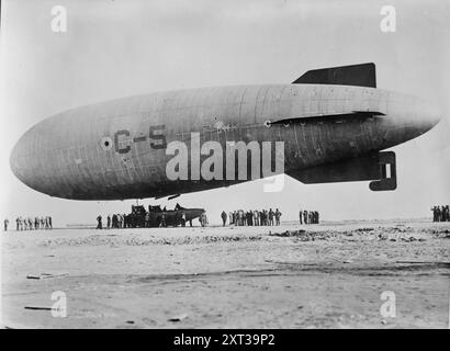 This image shows a U.S. Navy blimp flying over Beverly Hills ...