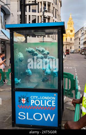 Banksy's artwork on a police box in Ludgate Hill, London Stock Photo ...