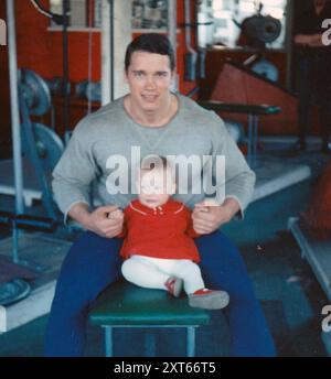 HOLLYWOOD LEGEND ARNOLD SCHWARZENEGGER WITH A YOUNG ADMIRER AT BOB ...