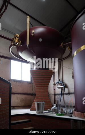 Double distillation process of cognac spirits in Charentias copper ...