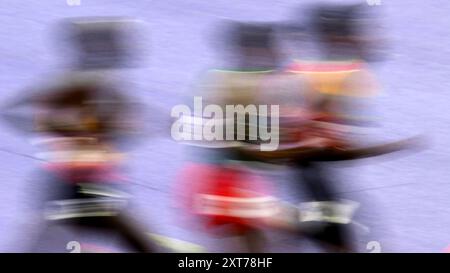 Atheltes compete in the men's 5000m final during the Paris 2024 Olympic ...