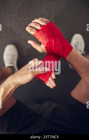 Man, boxer and wrapping knuckles with bandage for self defense, fight ...