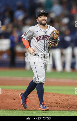 Houston Astros' Jose Altuve heads to first base after drawing a walk ...