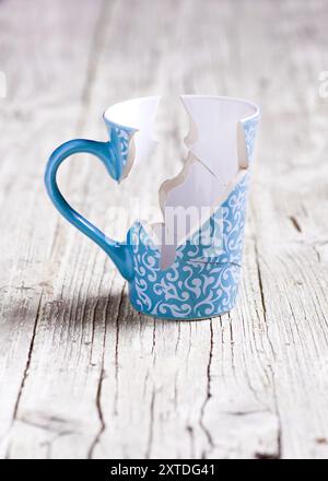 porcelain cup broken into pieces and stuck again Stock Photo - Alamy