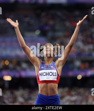 Monae' Nichols of the United States reacts as she competes in the women ...
