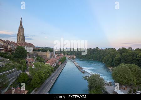 View of the Aar river at sunset as it passes through the city of Bern ...