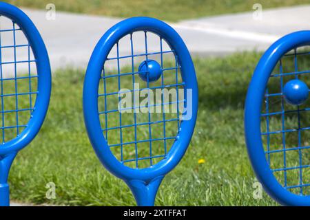 blue tennis racket bike rack Stock Photo - Alamy