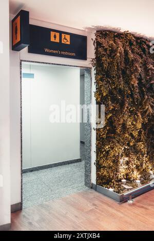 Modern public restroom facility located near a busy street in the city ...