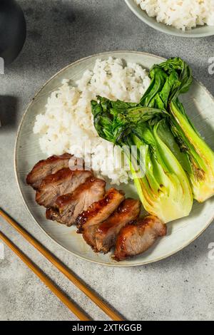Chinese Char Siu Pork with Bok Choy and White Rice Stock Photo - Alamy
