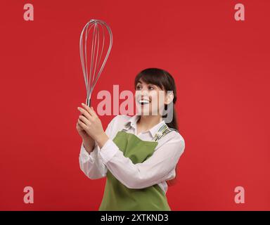 Happy pastry chef with big whisk on pink background. Banner design ...