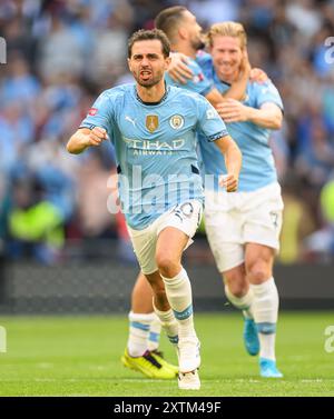 Manchester City's Bernardo Silva celebrates scoring his side's first ...