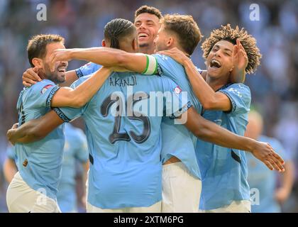 Manchester City players celebrate winning on penalties during the The ...