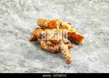 Fresh young Tumeric root heap for cooking Stock Photo - Alamy