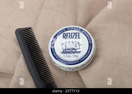 CHISINAU, MOLDOVA - July 18, 2024: REUZEL hair styling man, fiber ...