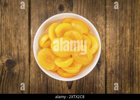 Pickled Apricots on a vintage background as detailed close-up shot ...