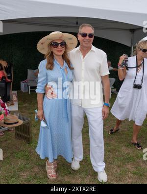 Maria Fishel and Ken Fishel attends the Rand Luxury Hamptons Concours ...