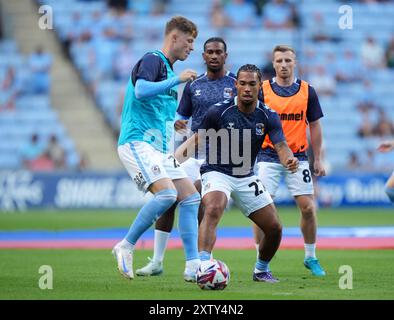 Coventry City's Victor Torp (left) celebrates scoring their side's ...