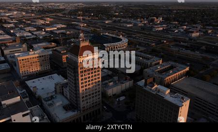 Fresno, California, USA - April 18, 2023: Sunset light shines on the ...