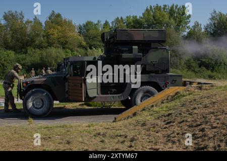 An M3P machine gun attached to an Avenger Air Defense System fires ...