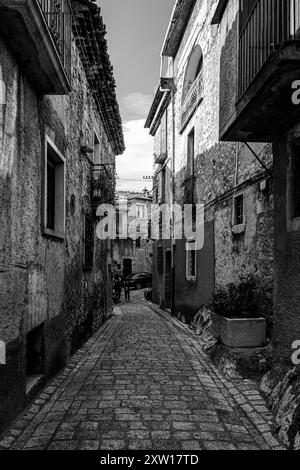 A narrow street of Cusano Mutri, a medieval town of Benevento province ...