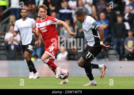 Middlesbrough's Aidan Morris (left) and Derby County's Harrison ...
