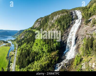 Aerial view of waterfall Reiarsfoss at lake Bygdlandsfjord, Setesdal ...