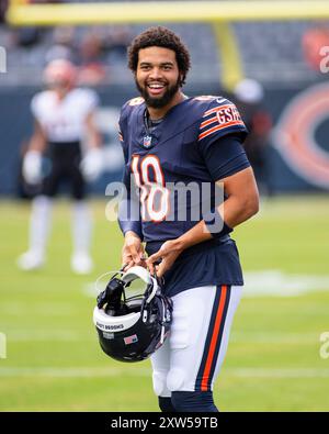 Chicago Bears' Caleb Williams warms up before an NFL football game ...