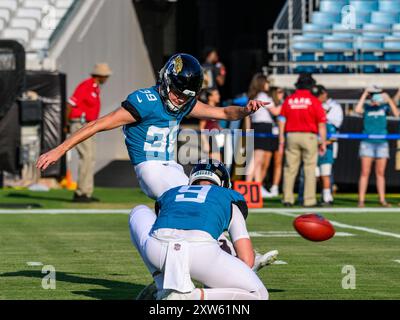 AFC punter Logan Cooke (9), of the Jacksonville Jaguars, and AFC wide ...