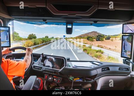 Traffic travels along State Highway 25 through the town of Thames on ...