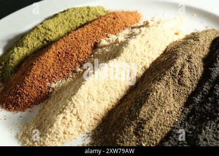 Different superfood powders on plate, closeup view Stock Photo - Alamy