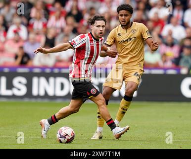 Queens Park Rangers' Jonathan Varane and Sheffield United's Callum O ...
