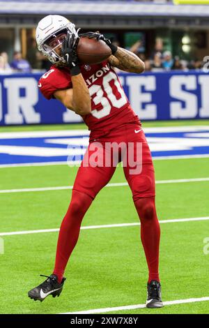 Arizona Cardinals wide receiver Xavier Weaver, right, arrives to State ...