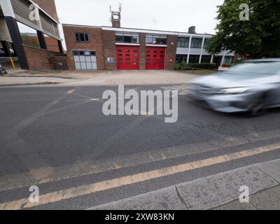 Faded and Worn box Junction outside fire station Loughton, Essex Stock ...