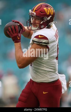 Washington Commanders tight end Colson Yankoff (41) rushes during an ...