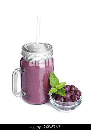 Tasty acai juice in mason jar and berries isolated on white Stock Photo ...