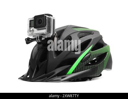Modern action camera on helmet against white background Stock Photo - Alamy