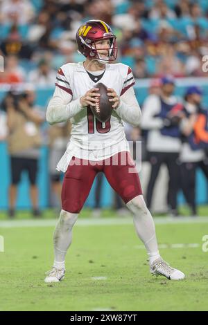 Washington Commanders quarterback Jeff Driskel (2) warms up before an ...