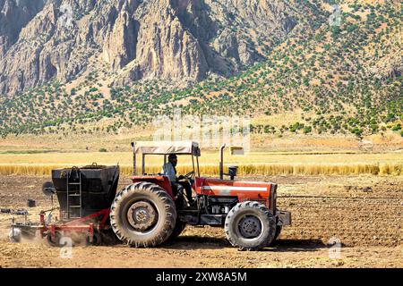 siraz,fars,iran,march 13 2023,Tractor working on agricultural land ...