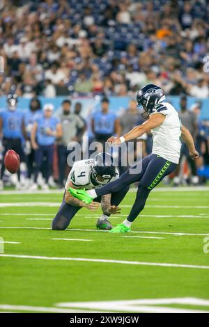 Seattle Seahawks place-kicker Jason Myers, left, hugs Las Vegas Raiders ...