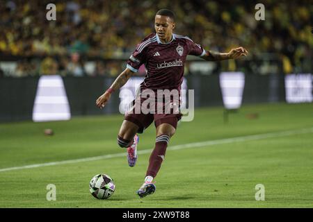 Colorado Rapids forward Calvin Harris, right, kicks the ball past ...