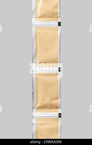 strips of blank foil sachet packets isolated white background, food or ...