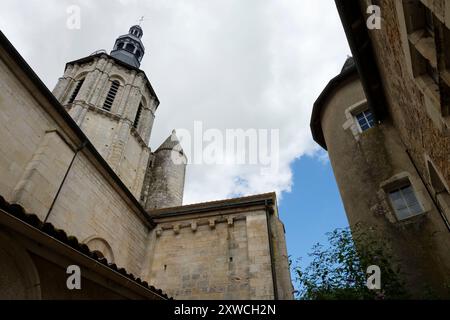 St Nicholas Church in Civray, France viewed from a passageway Stock ...