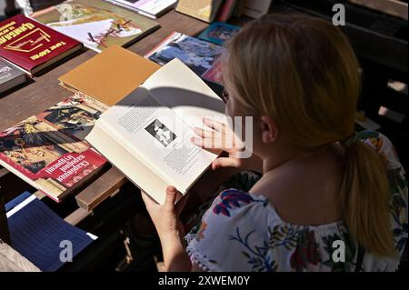 LVIV, UKRAINE - AUGUST 18, 2024 - People exchanged almost 5,000 books ...