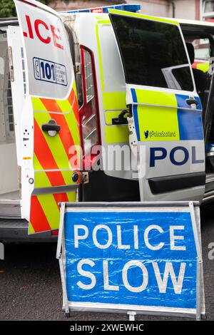 Blue Police slow sign Stock Photo - Alamy