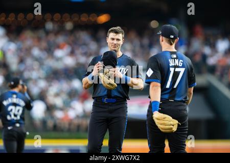 Detroit Tigers shortstop Trey Sweeney throws to first base during the ...