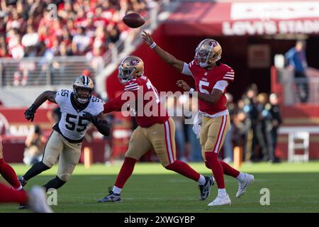 San Francisco 49ers quarterback Joshua Dobbs (5) scores a touchdown ...