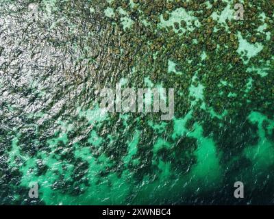 Aerial view of Koh Ra Wi, its beautiful coral reefs and turquoise water ...