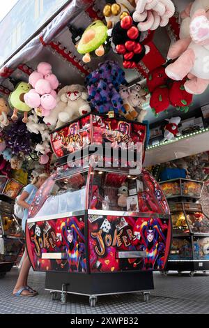 Coin pushing pusher machine with flashy animations, spectacular light ...