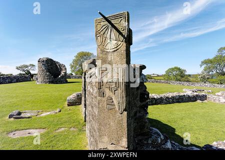 Stump of the Round Tower and mediaeval sundial of Nendrum Monastery ...