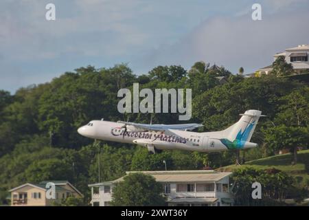 Caribbean Airlines plane 9Y-TTE taking off from Castries, St. Lucia ...